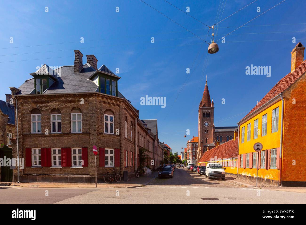 District Nyboder with yellow historic row houses and St Paul Church in ...