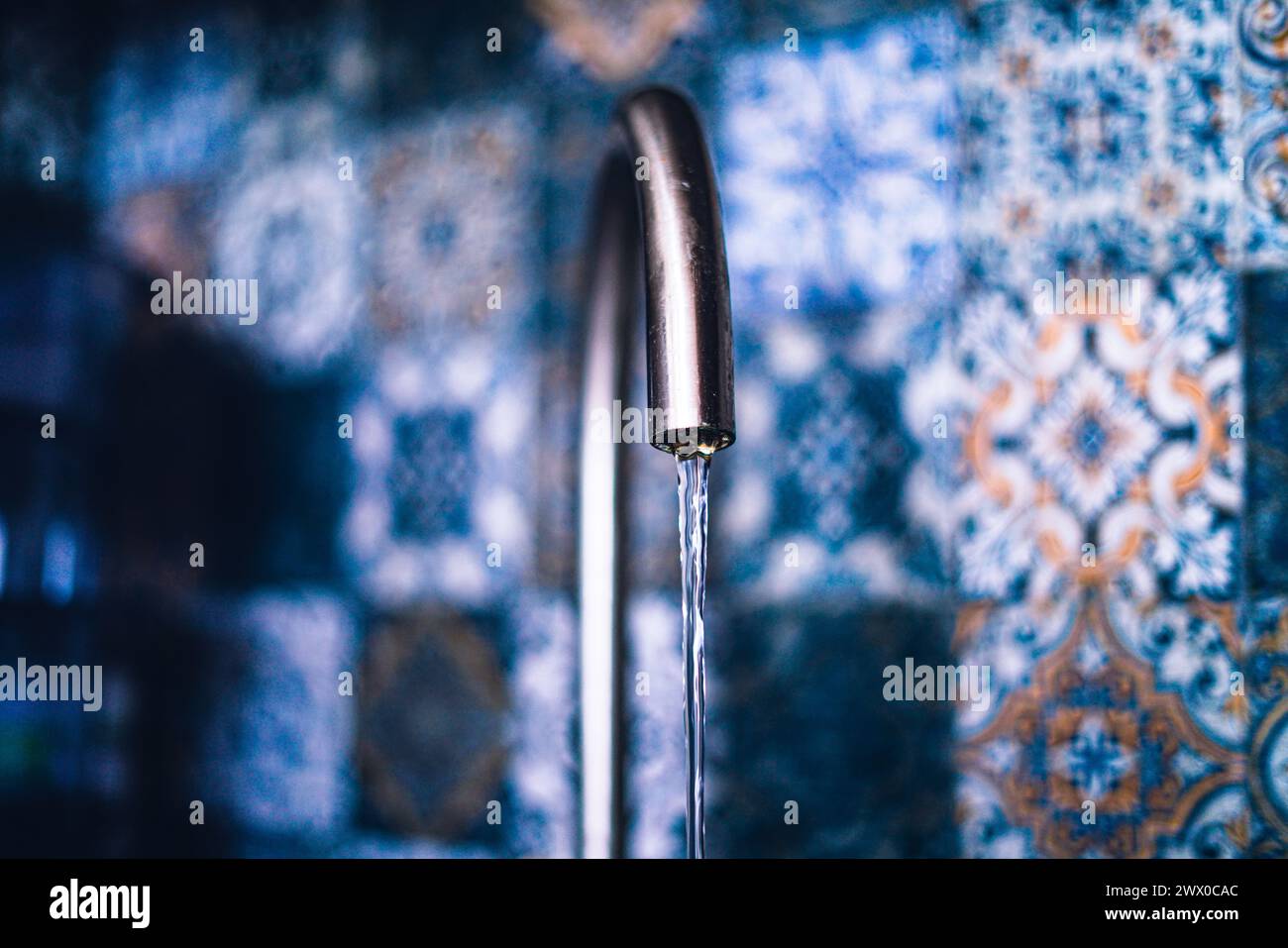 Modern silver faucet at home Stock Photo - Alamy