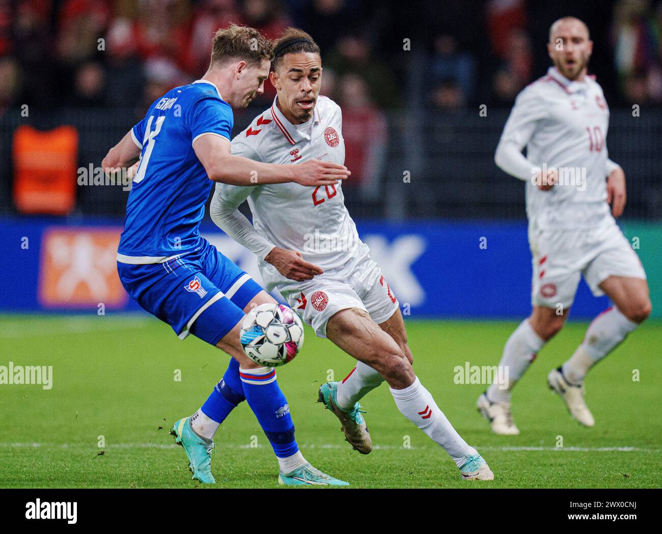 Denmark's Yussuf Poulsen and the Faroe Islands' Hoerdur Askham during ...