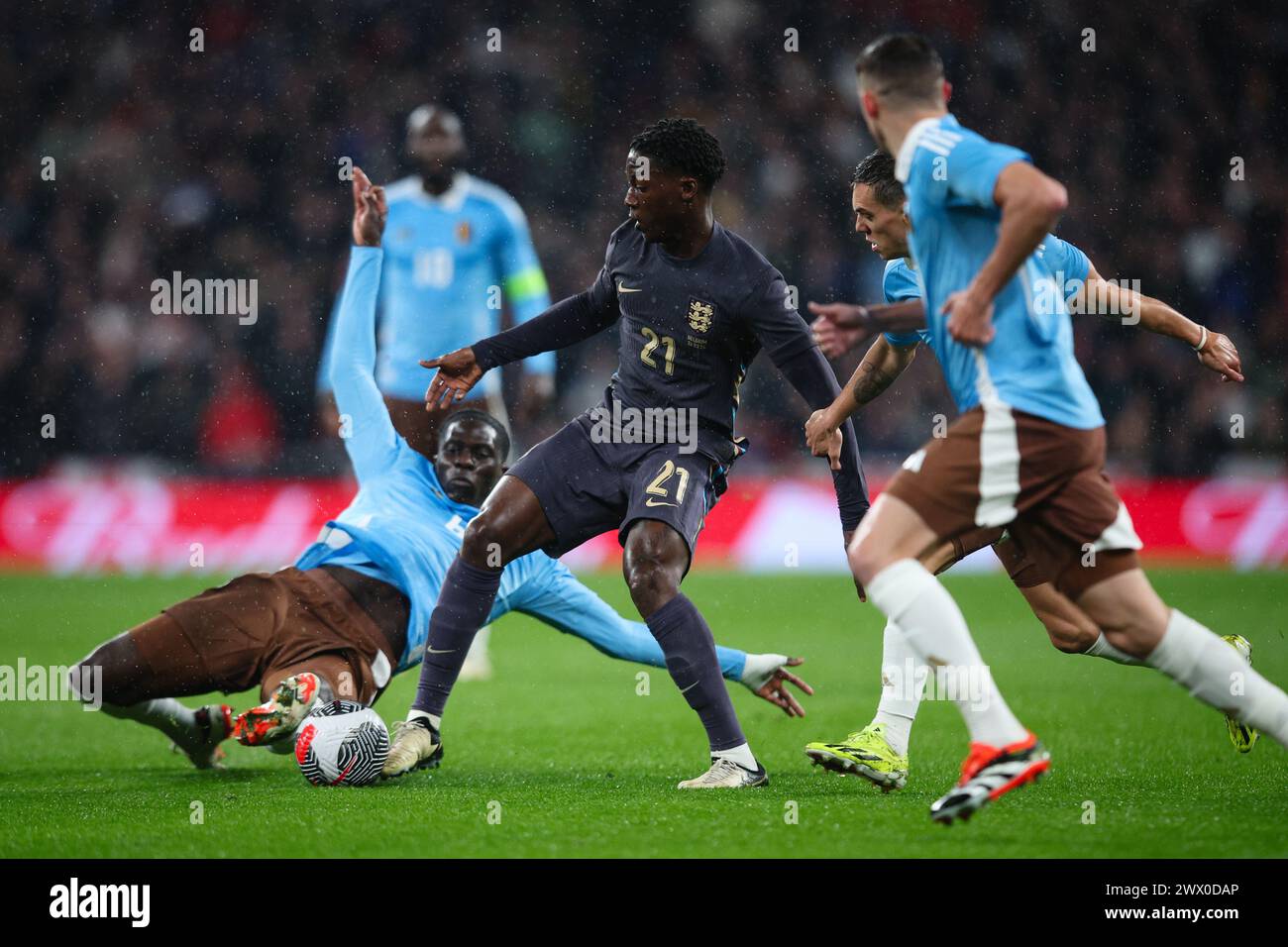 LONDON, UK - 26th Mar 2024: Kobbie Mainoo of England under pressure ...