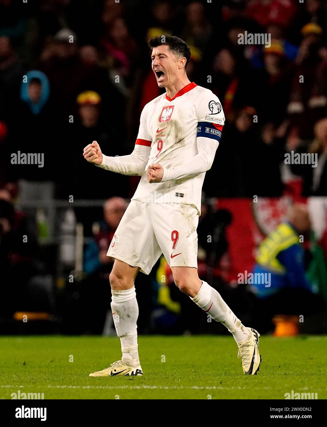 Poland's Robert Lewandowski celebrates scoring in the penalty shoot out ...