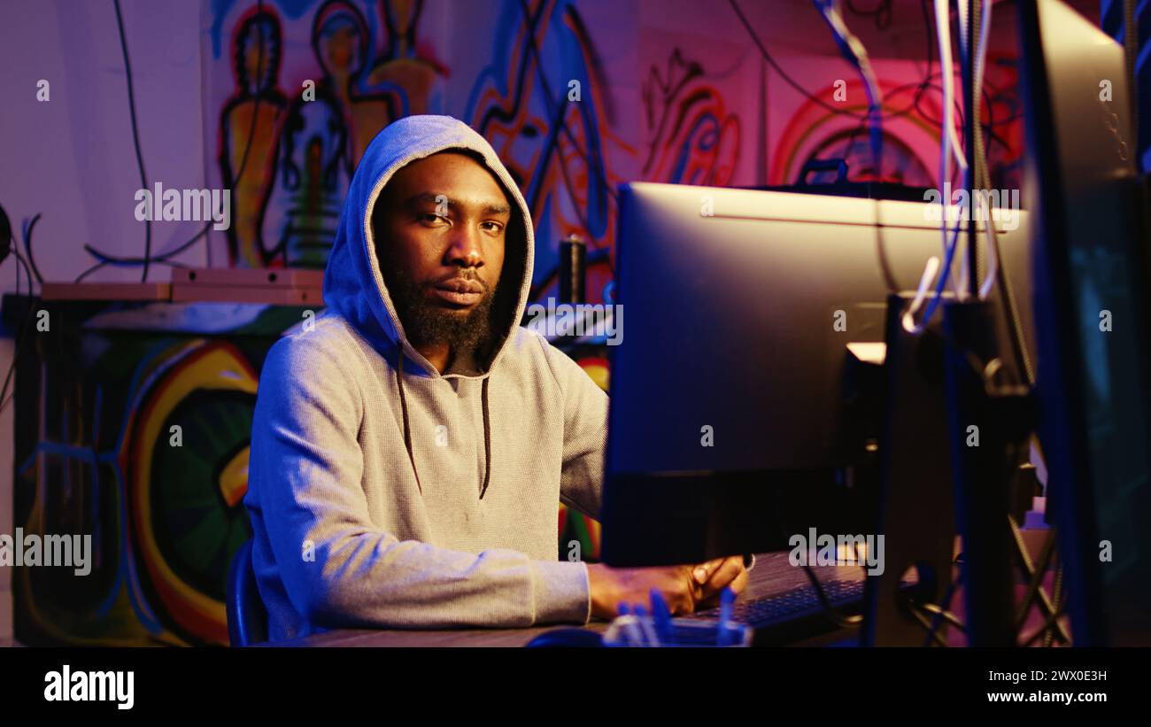 Close up shot of african american man hacking systems, stealing credit ...