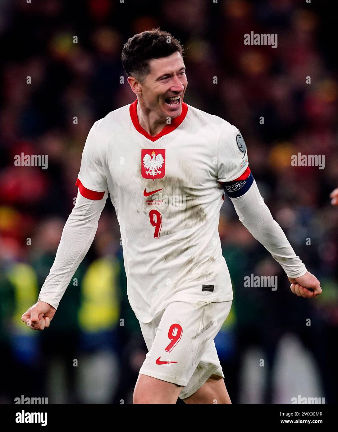 Poland's Robert Lewandowski celebrates after winning the penalty shoot ...