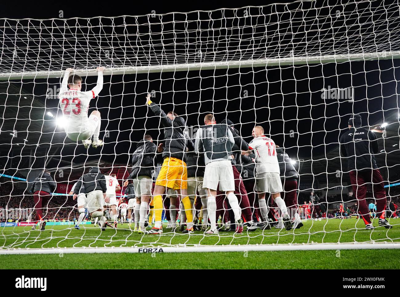 Poland goalkeeper Wojciech Szczesny celebrates saving the penalty of ...