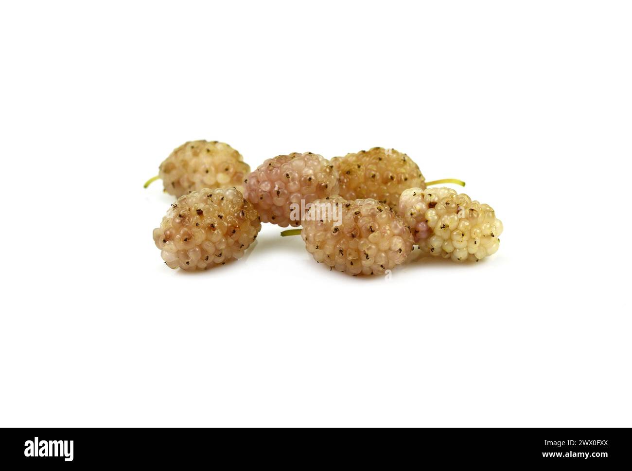 Heap of fresh ripe white mulberry berries with leaves isolated on white ...