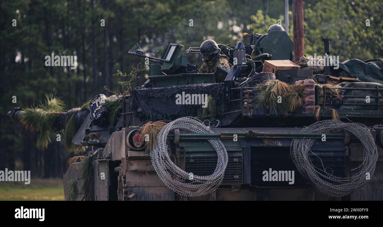 An M1A2 Abrams Main Battle Tank crew assigned to 3rd Battalion, 69th ...