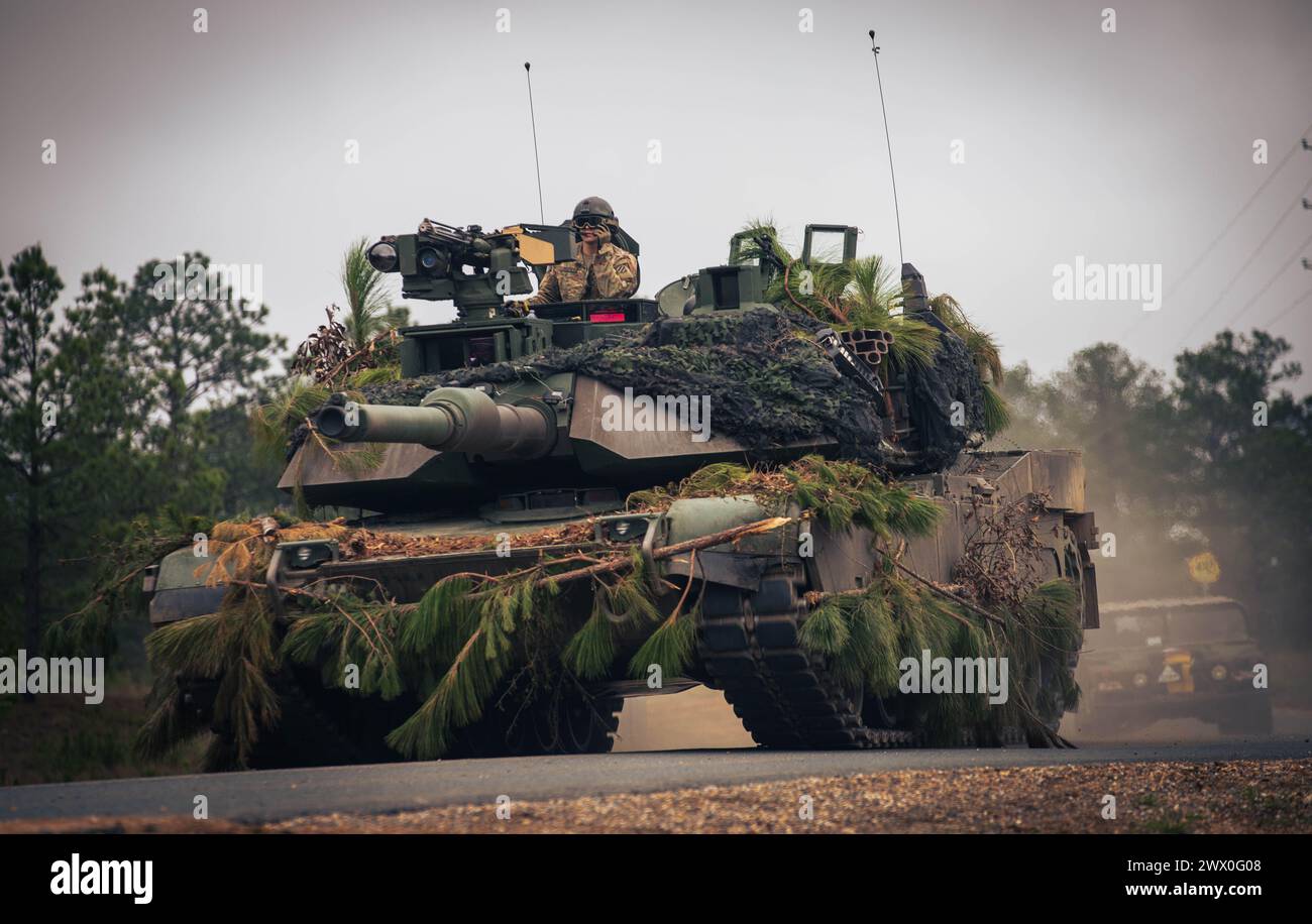 An Abrams Tank crew assigned to 3rd Battalion, 69th Armor Regiment, 1st ...