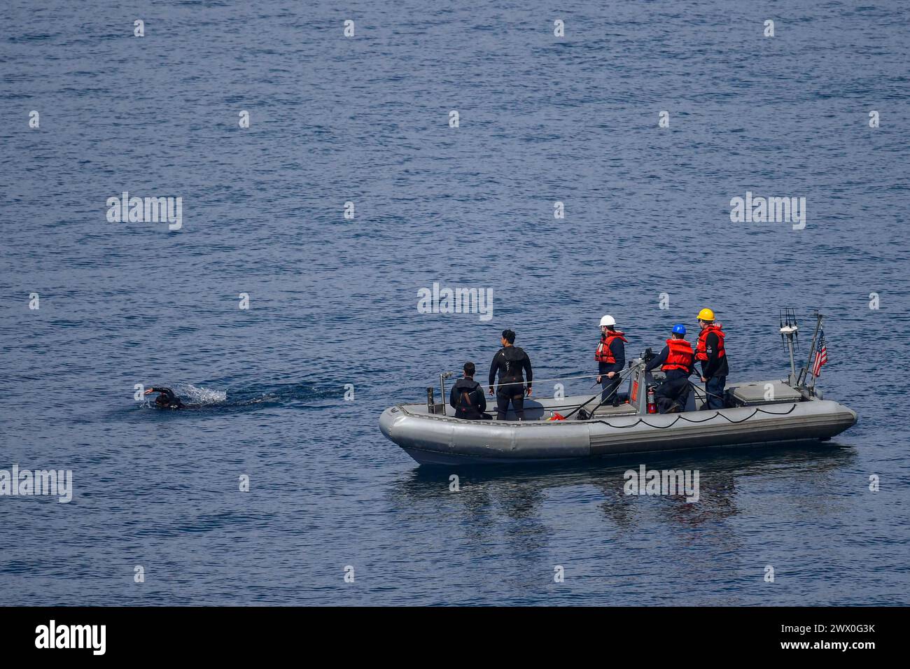 Sailors assigned to the USS Boxer (LHD 4) conduct search and rescue ...