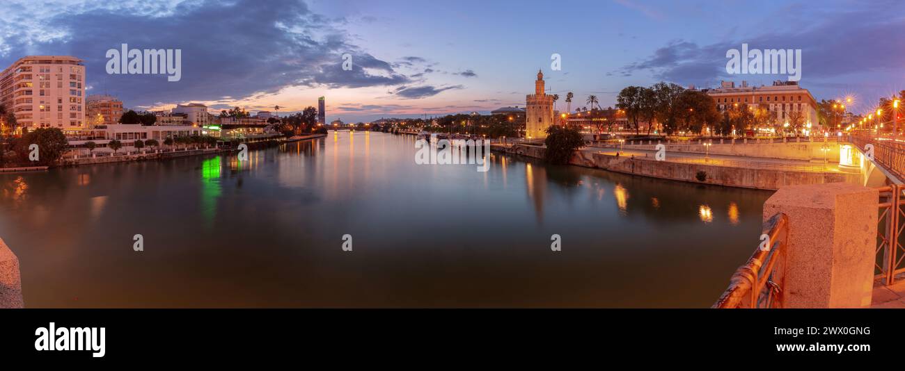 The famous Golden Tower in Seville at sunset Stock Photo - Alamy