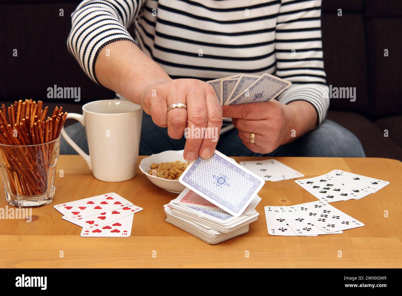 Woman Playing Cards Stock Photo - Alamy