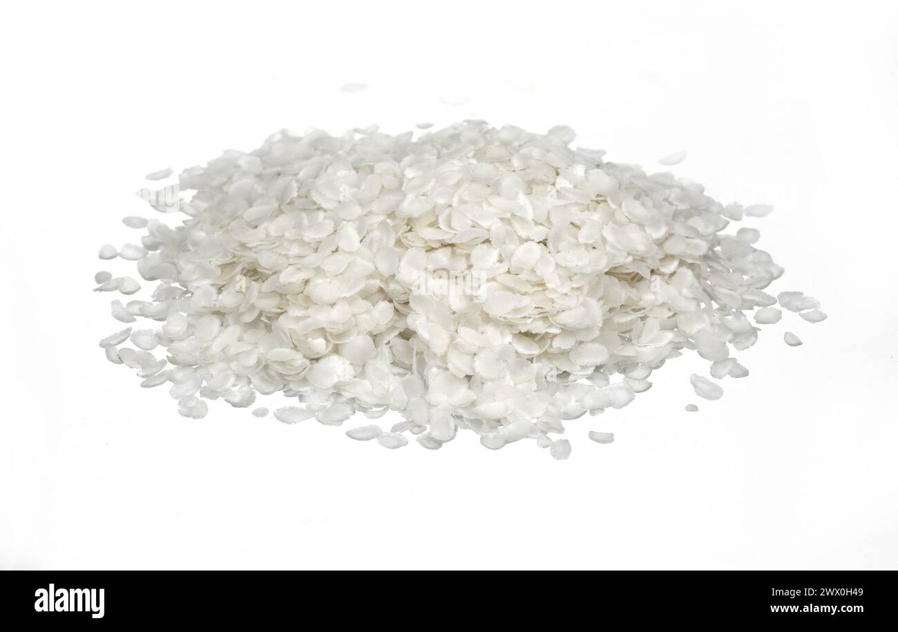 flattened rice flakes isolated on white Stock Photo - Alamy