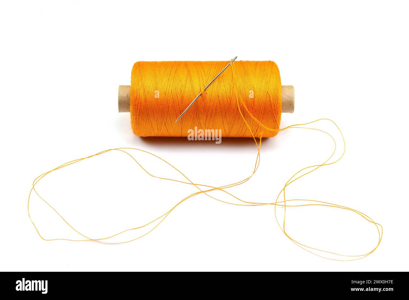 Color sewing threads isolated on white background Stock Photo - Alamy