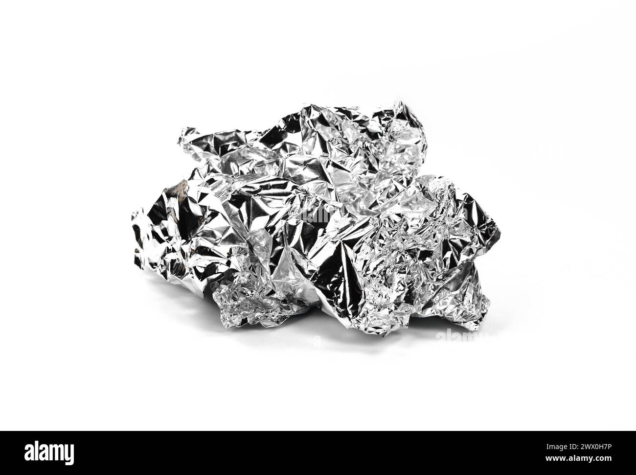 crumpled foil closeup isolated on white background Stock Photo - Alamy