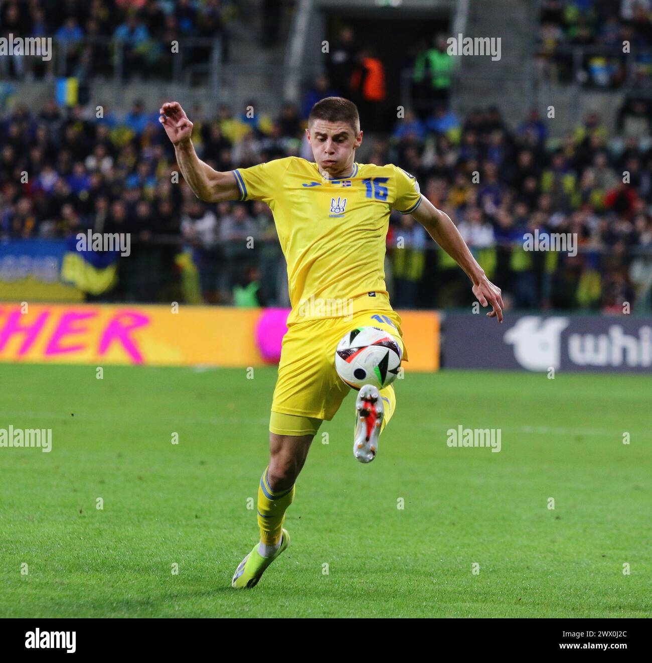 Wroclaw, Poland - March 26, 2024: Vitaliy Mykolenko of Ukraine controls ...