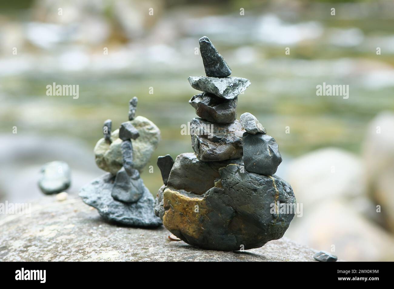 Meditative rock balancing hi-res stock photography and images - Alamy
