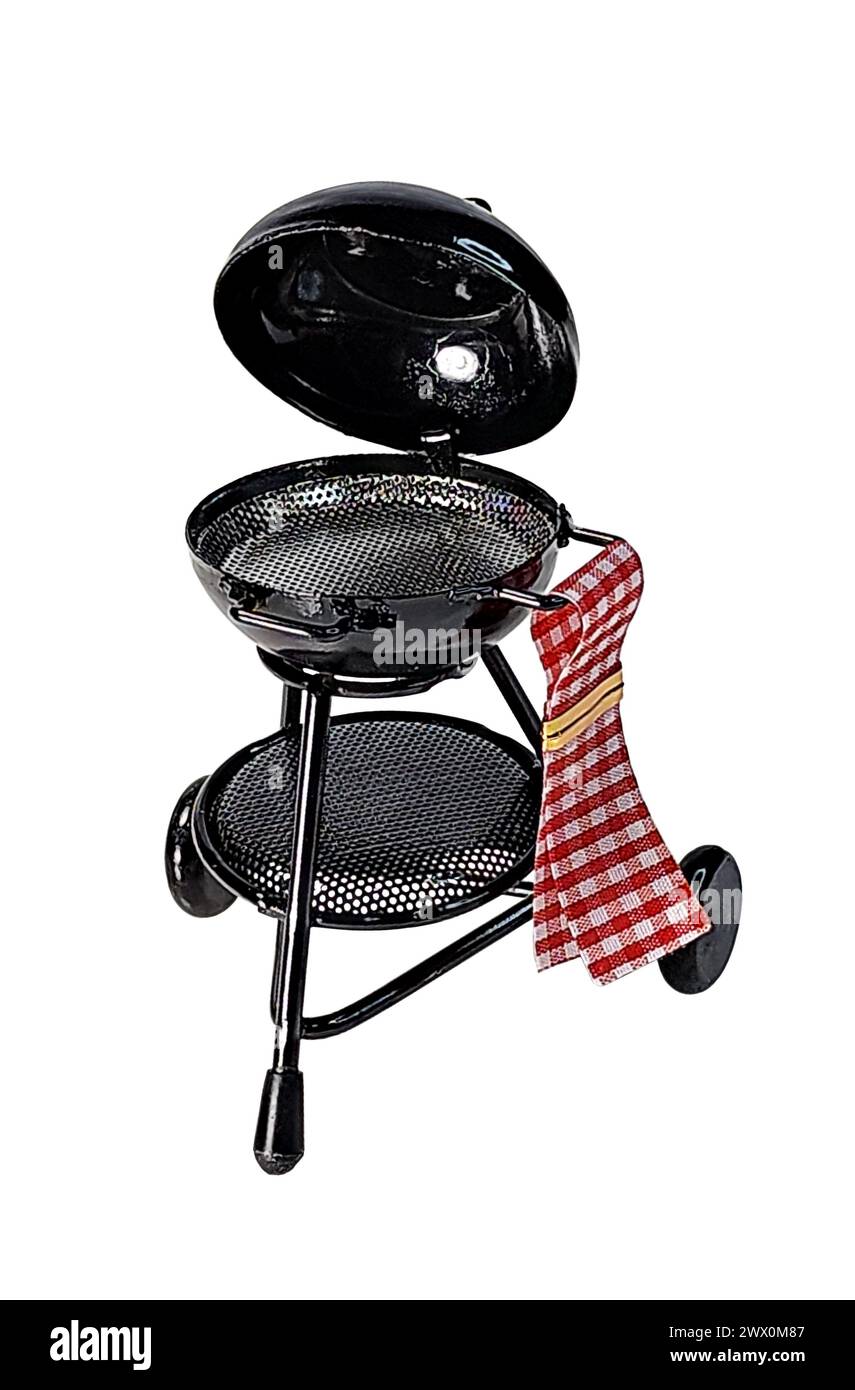 Black round barbeque grill used for cooking food outside Stock Photo ...
