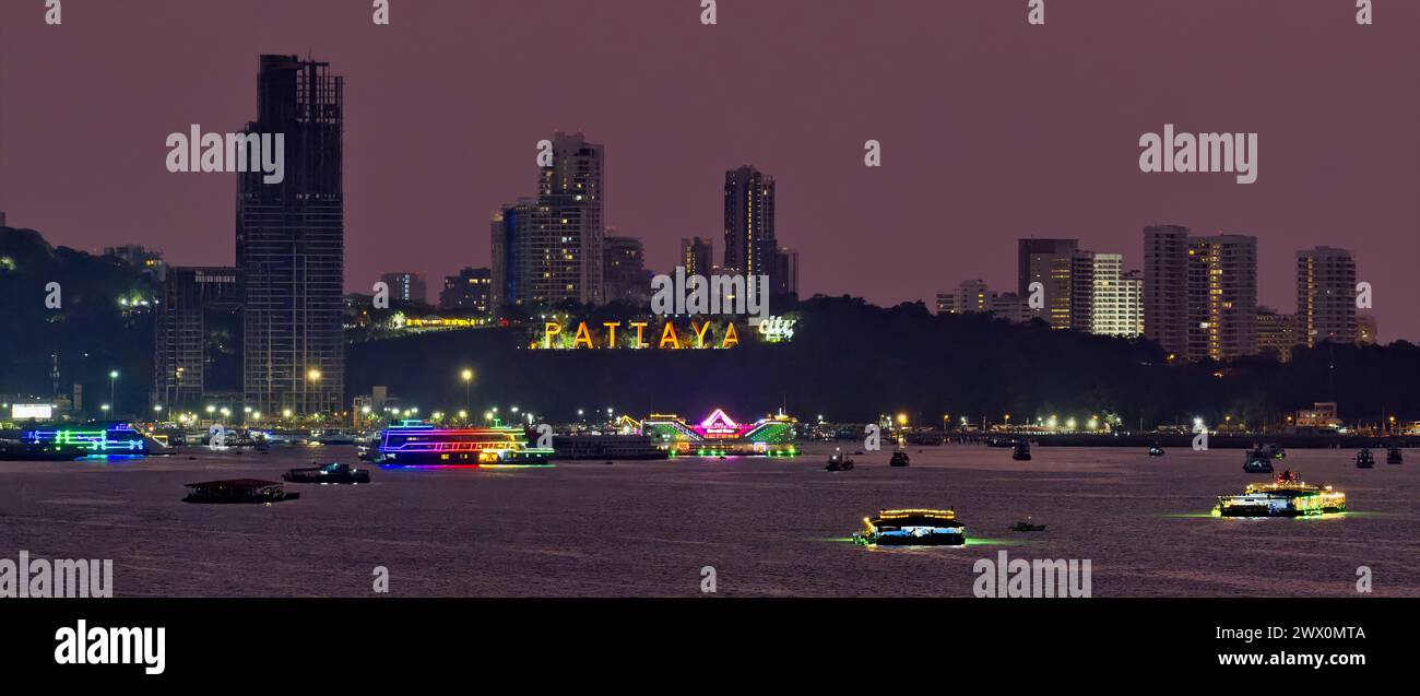 Night time distant view of Pattaya sign on ridge at Khao Phra Tamnak ...