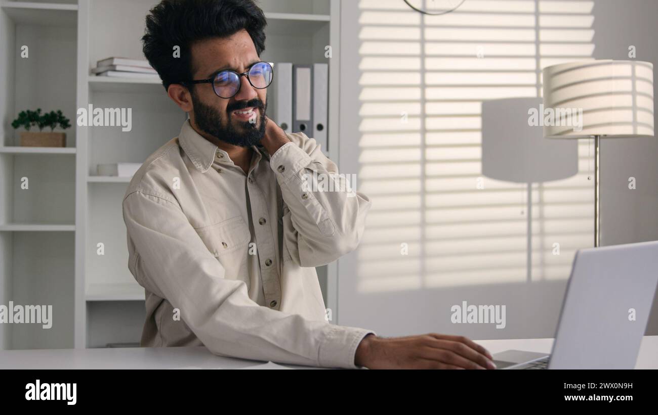 Tired displeased Indian Arabian business man businessman office manager ...