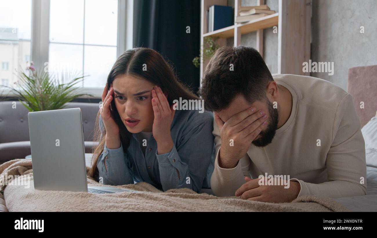 Upset couple disappointed woman wife and man husband Caucasian family ...