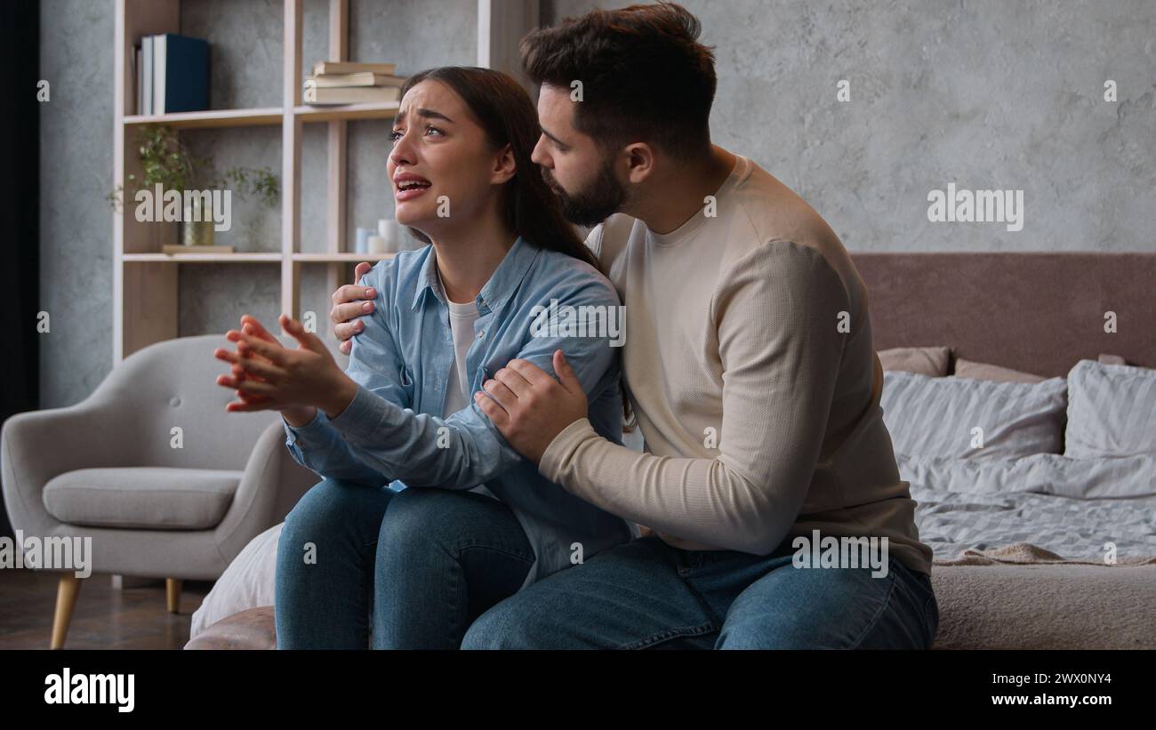 Caucasian man apologizing husband calming anxious annoyed wife ask ...