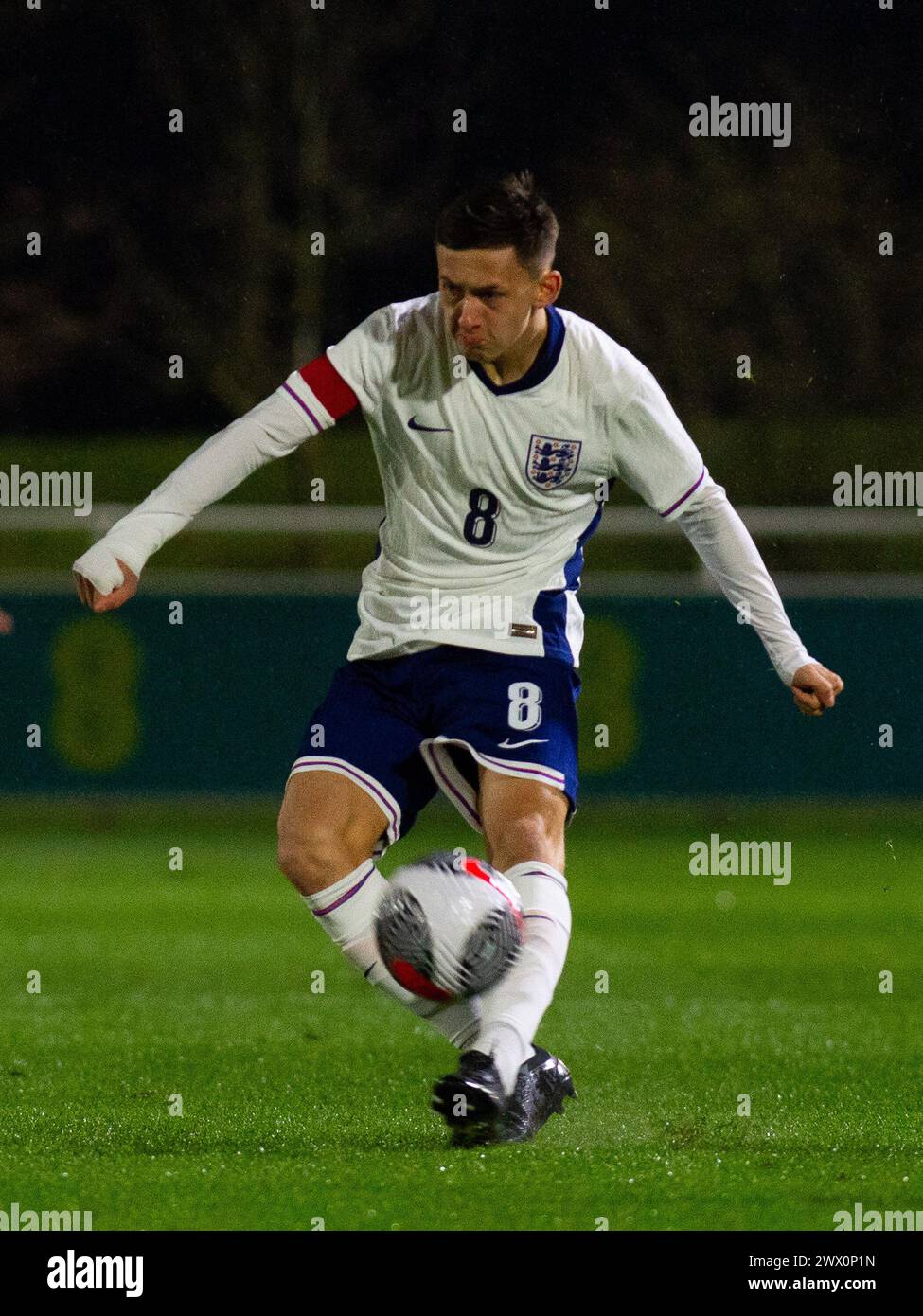 St Georges Park, UK. 26th Mar, 2024. Christopher Ring (8) for England ...