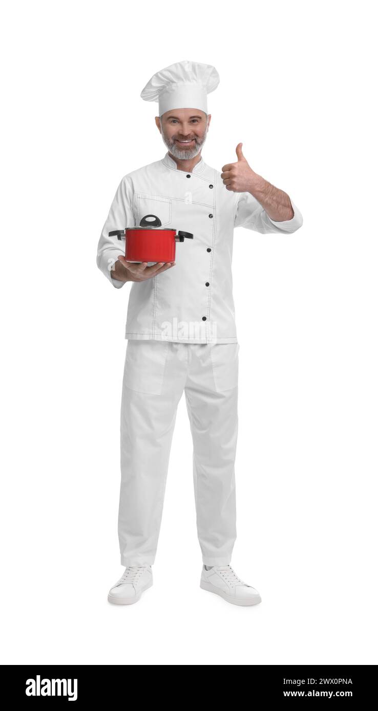 Happy chef in uniform with cooking pot showing thumbs up on white ...