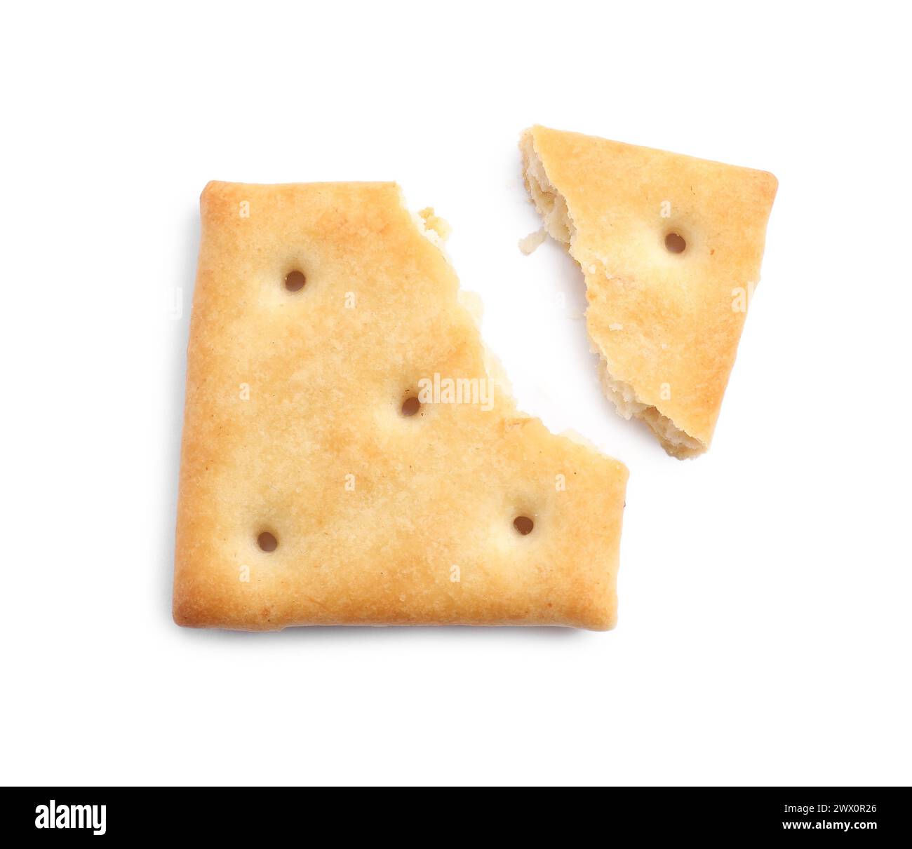 Crispy broken cracker isolated on white, top view Stock Photo - Alamy