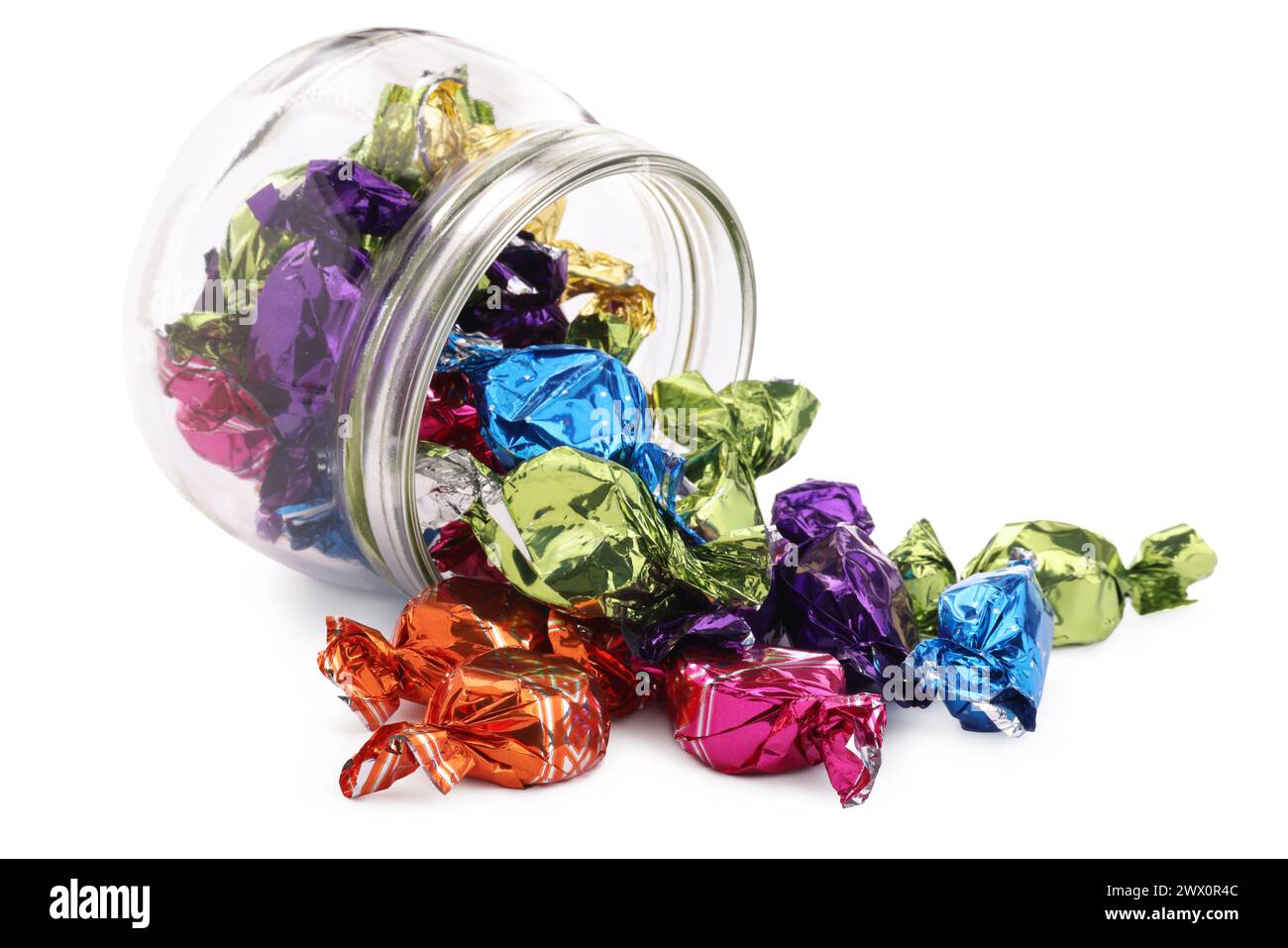 Glass jar with candies in colorful wrappers isolated on white Stock ...