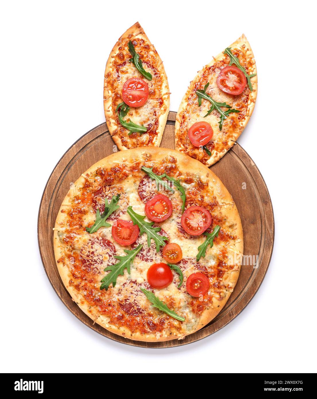 Board with Easter pizza with bunny ears isolated on white background ...