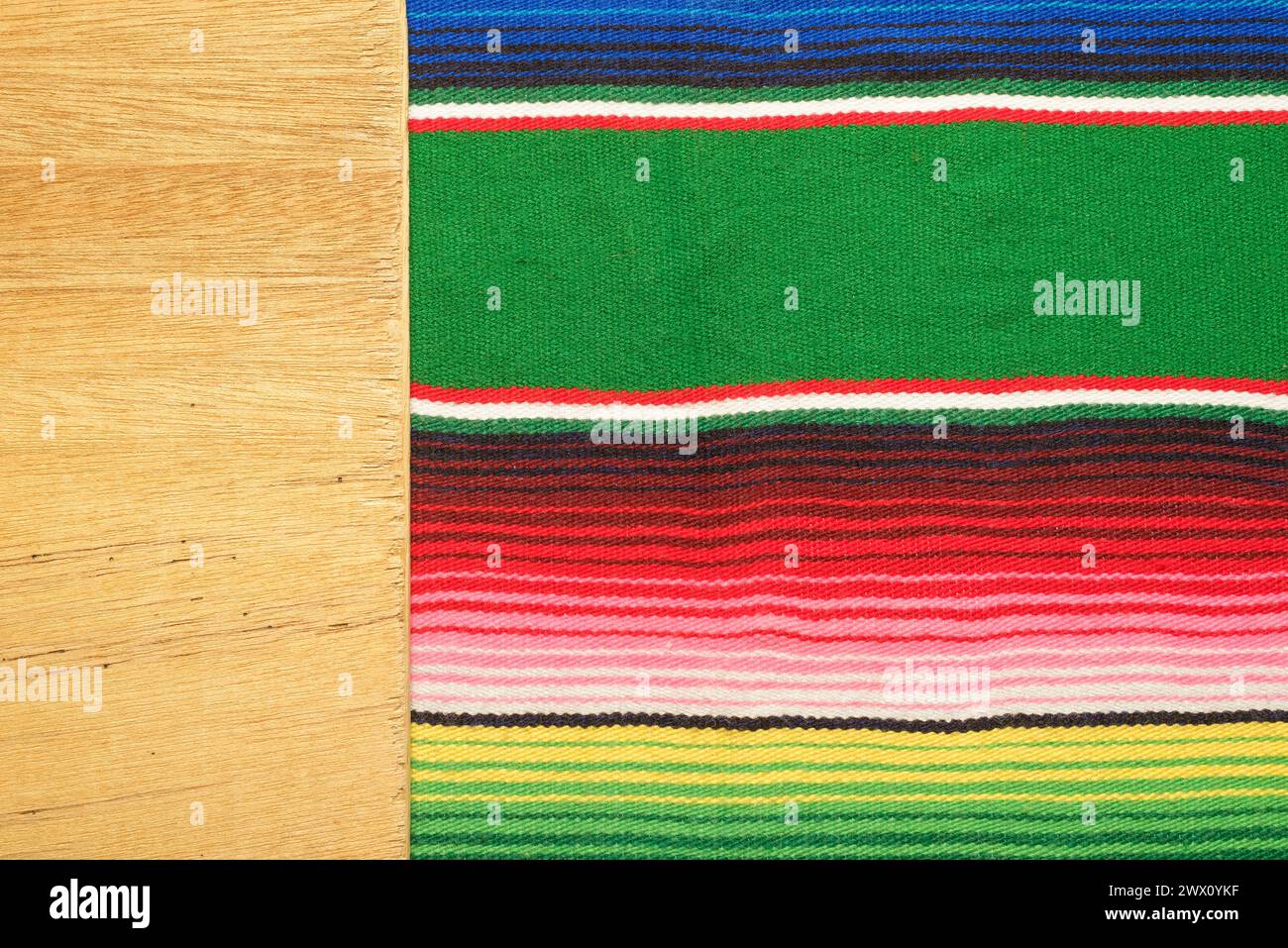 Piece of wood on colorful serape. Empty template for text, Cinco de ...
