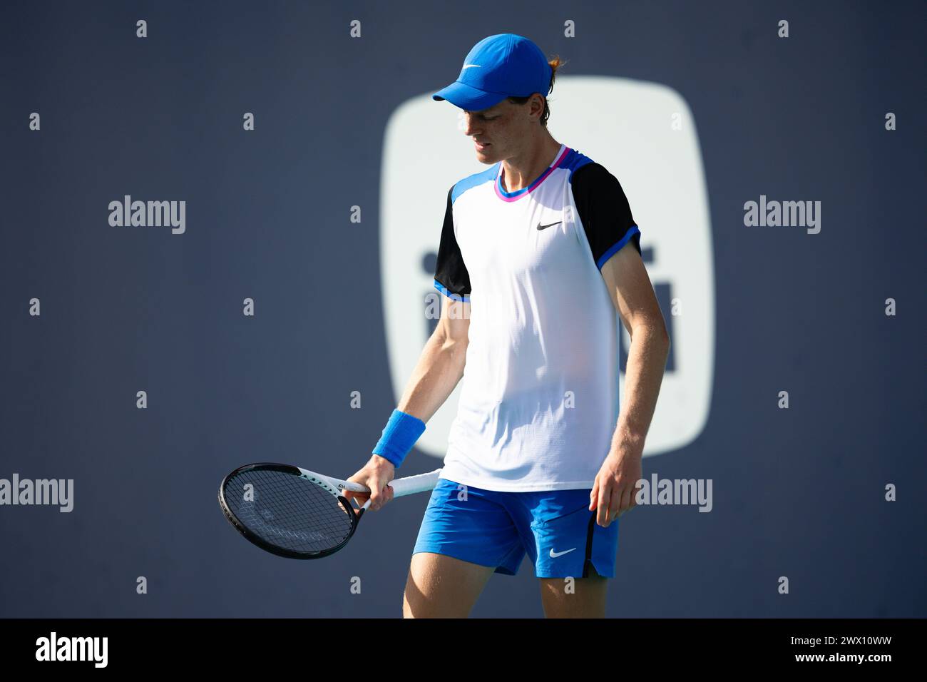 MIAMI GARDENS, FLORIDA - MARCH 26: Jannik Sinner of Italy looks at his ...