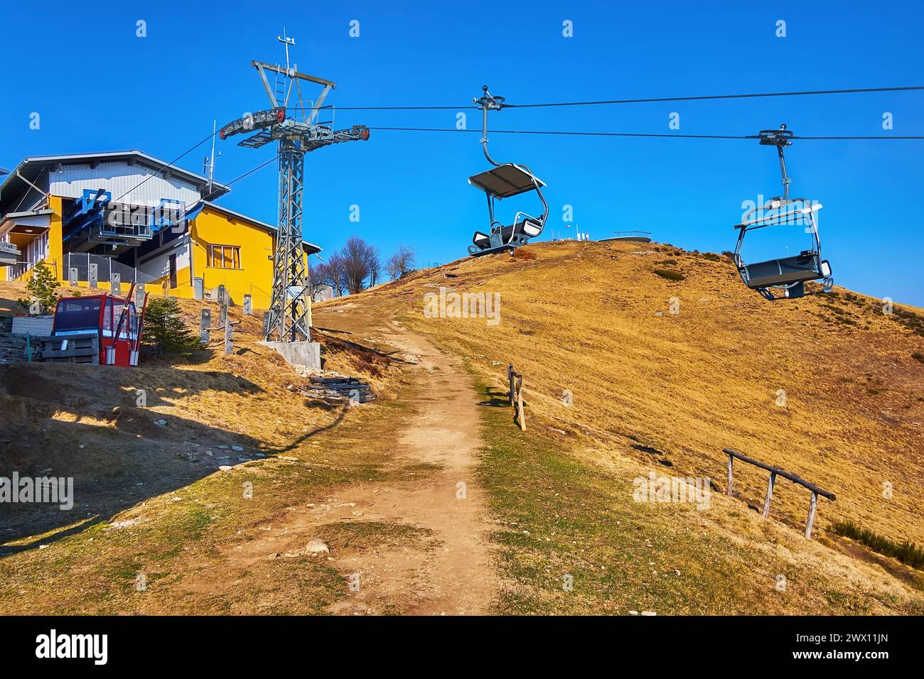 The upper station of Cardada Cimetta chairlift in front od the peak of ...