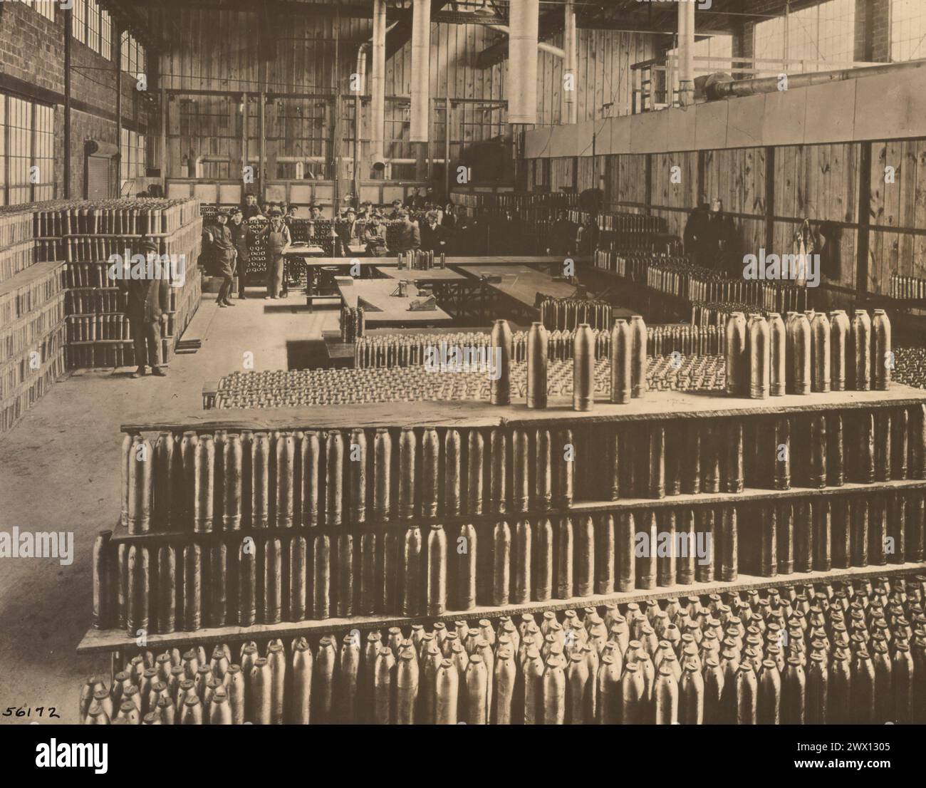 Manufacturing high explosive shells. High explosive shells ready to be ...