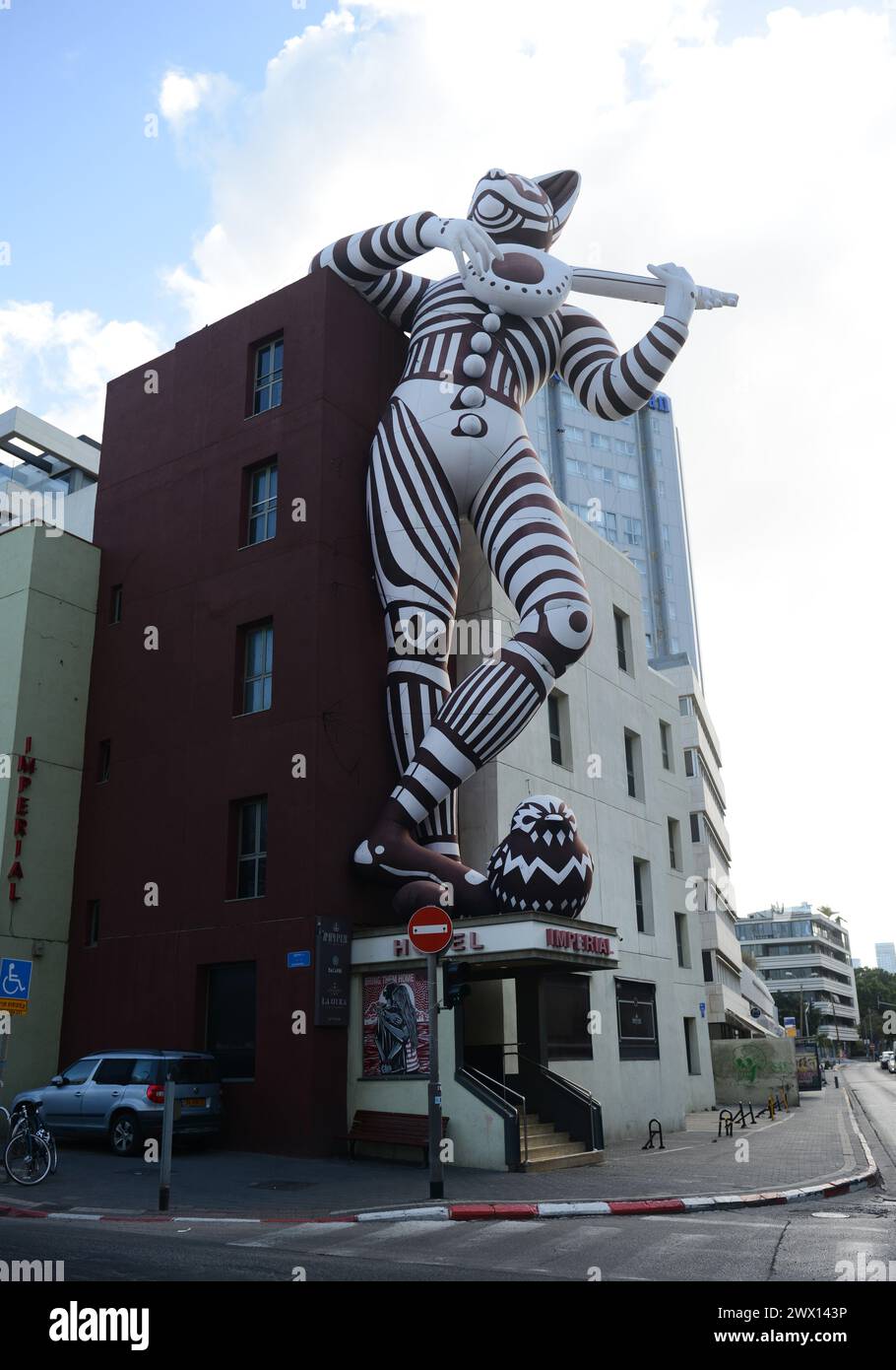 An inflatable statue installed above the entrance of the Imperial hotel ...