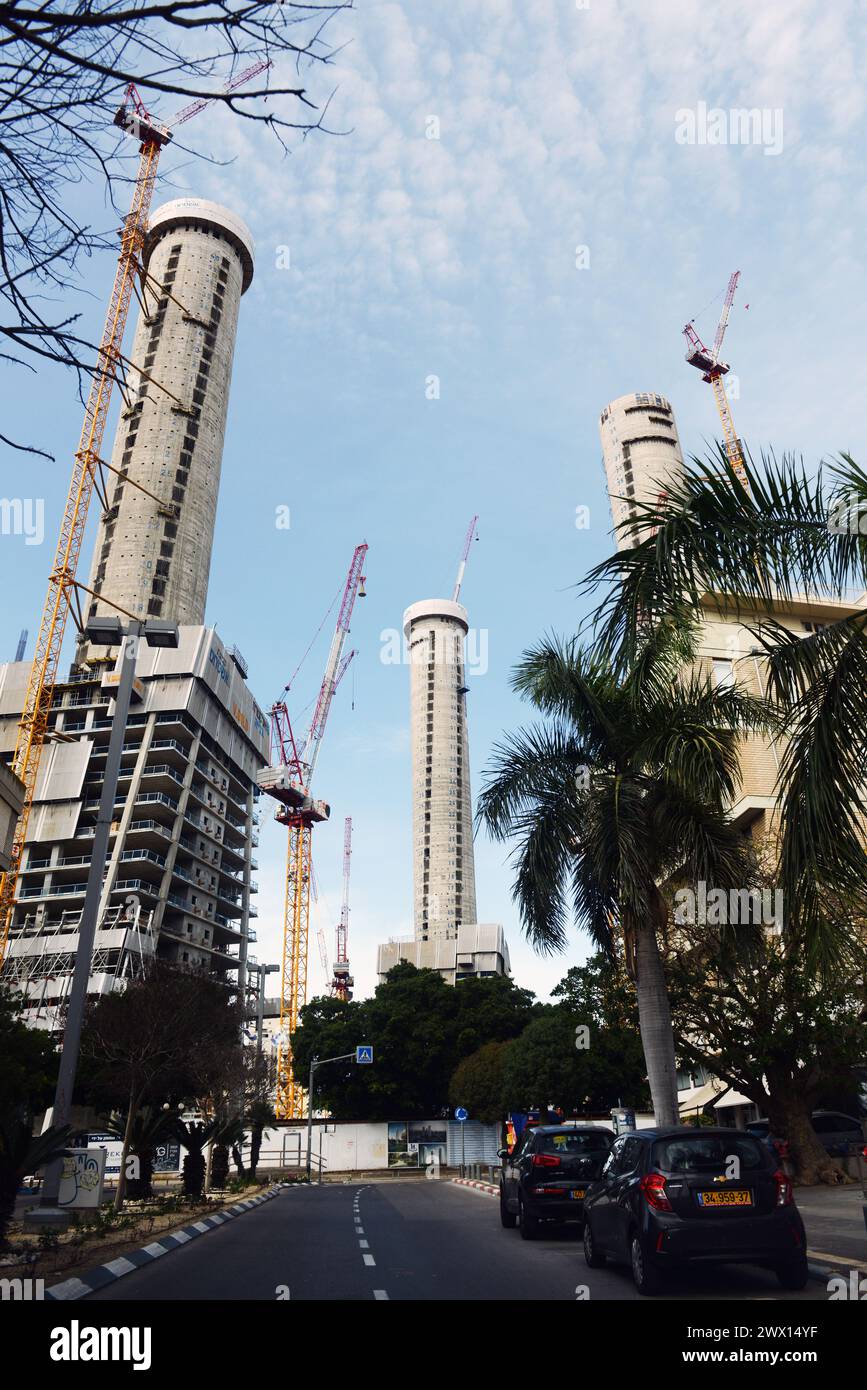 A modern urban complex with three towers under construction in Kikar ...