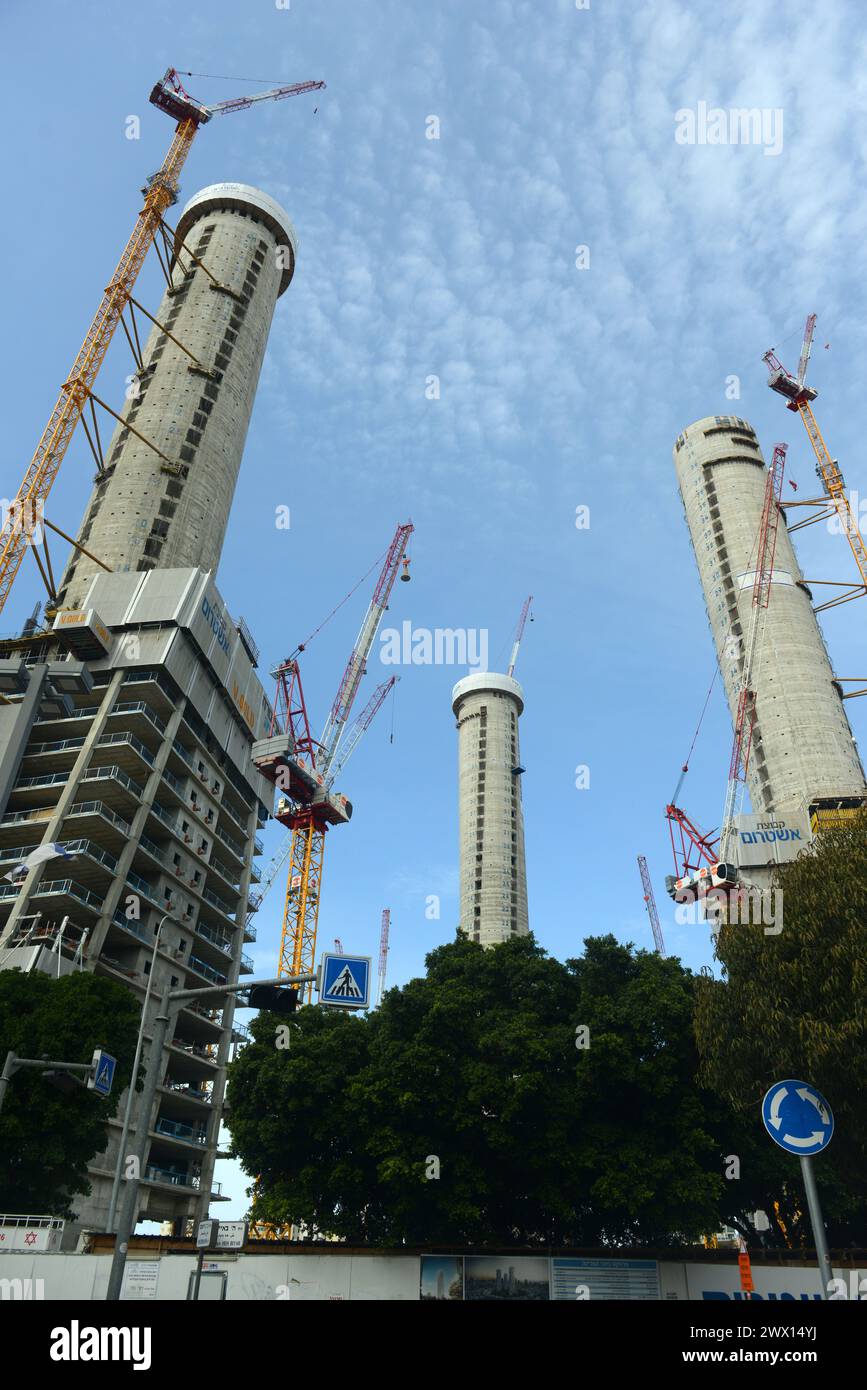 A modern urban complex with three towers under construction in Kikar ...