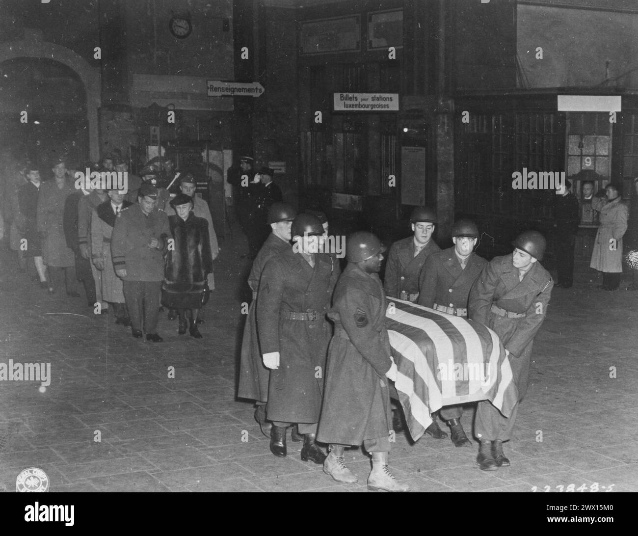 Original Caption: GENERAL PATTON'S FUNERAL The pallbearers carry ...