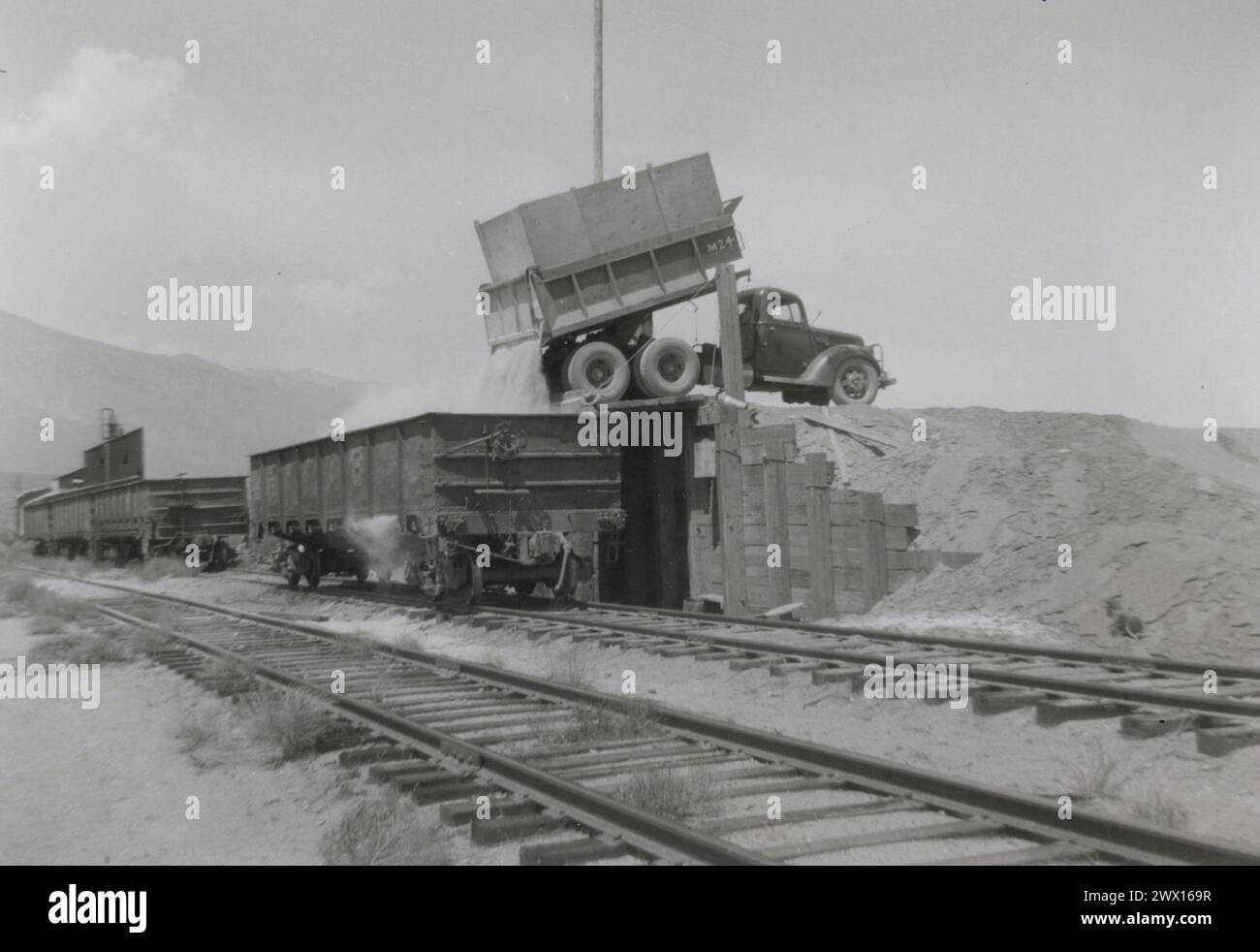 A dump truck used for loading rail cars at Sykes siding on land ...
