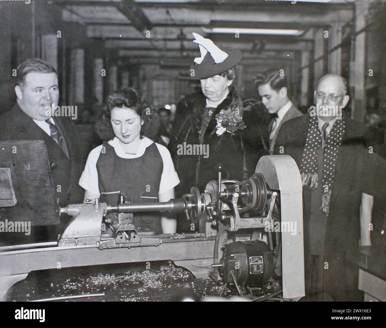 This photograph depicts First Lady Eleanor Roosevelt as she visits ...
