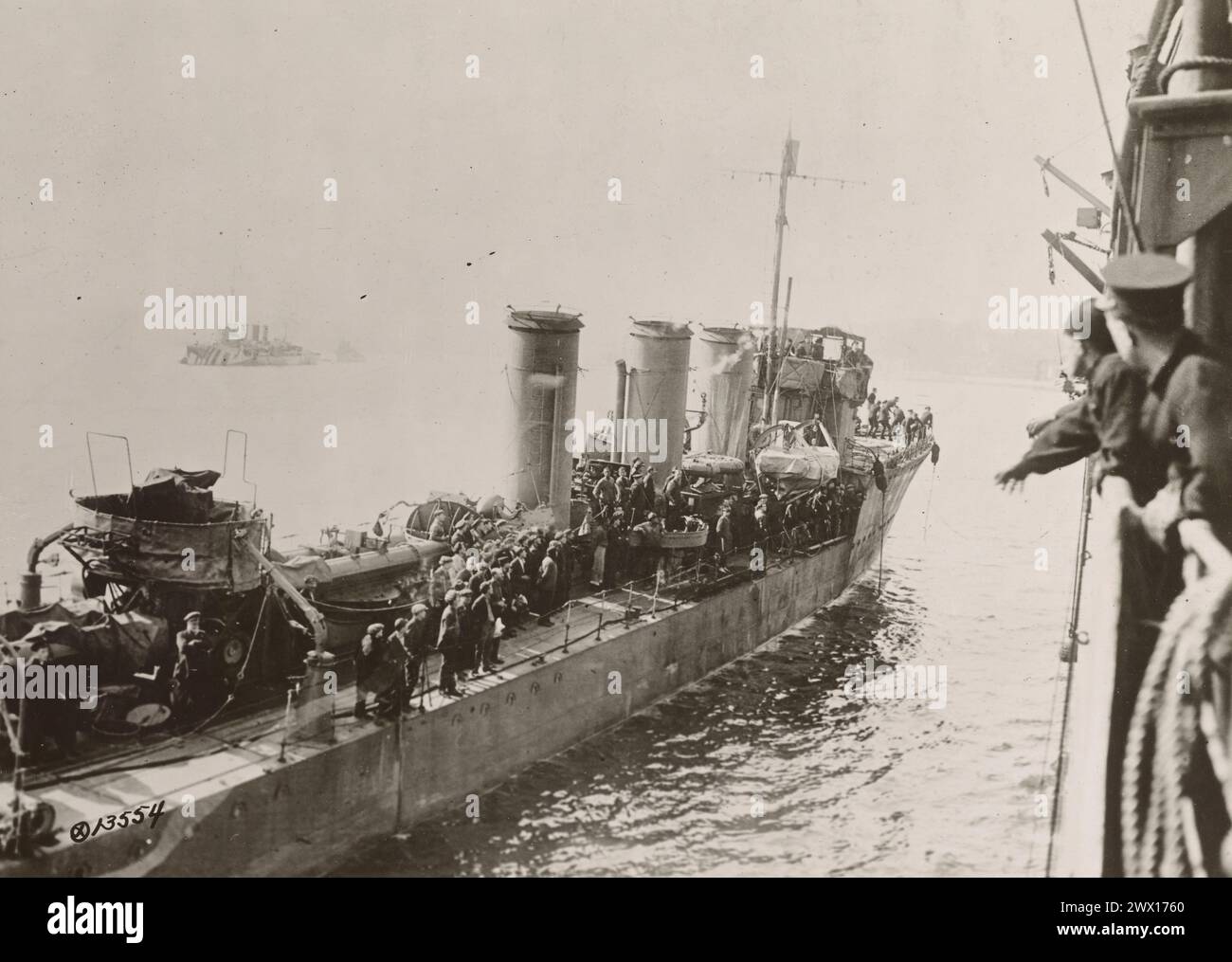 Survivors of a torpedoed vessel sunk by a German submarine arrives at ...