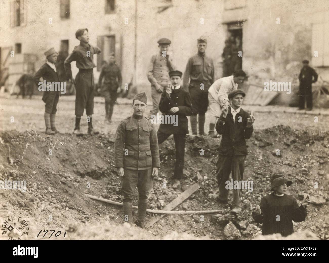 Shell hole made in front of American soldiers' billet made by a long ...