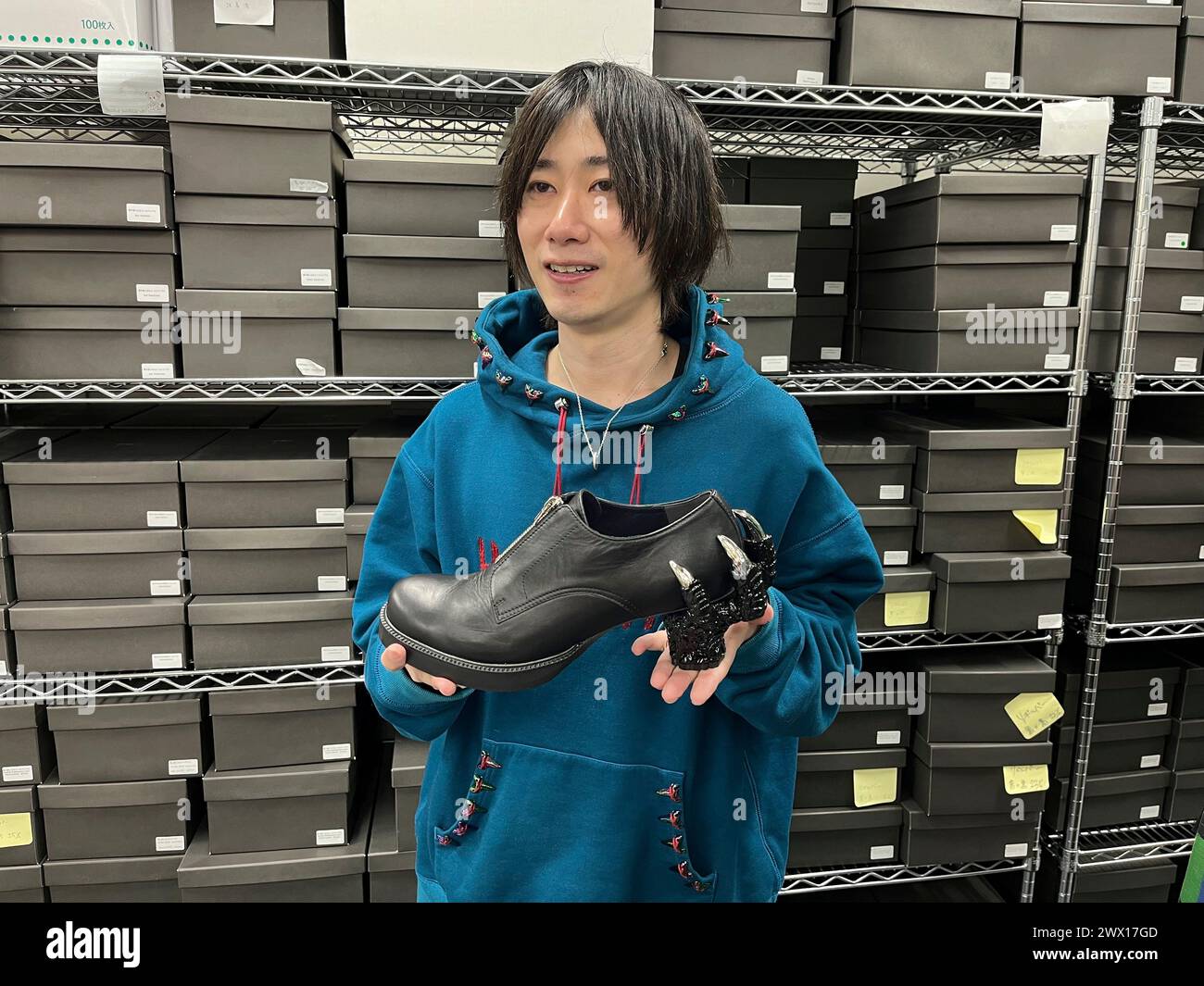 Ryosuke Matsui, the Japanese designer of the Godzilla shoes worn by the Oscar-winning team at ...
