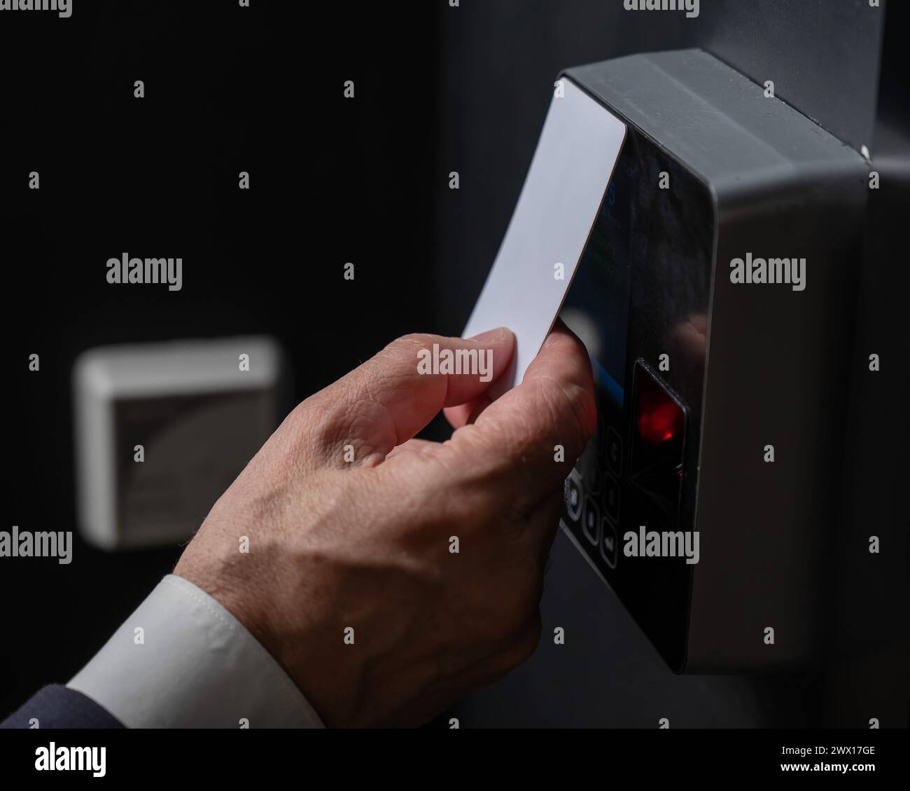 A man opens the door with a card. Modern electronic lock. Keyless Entry ...