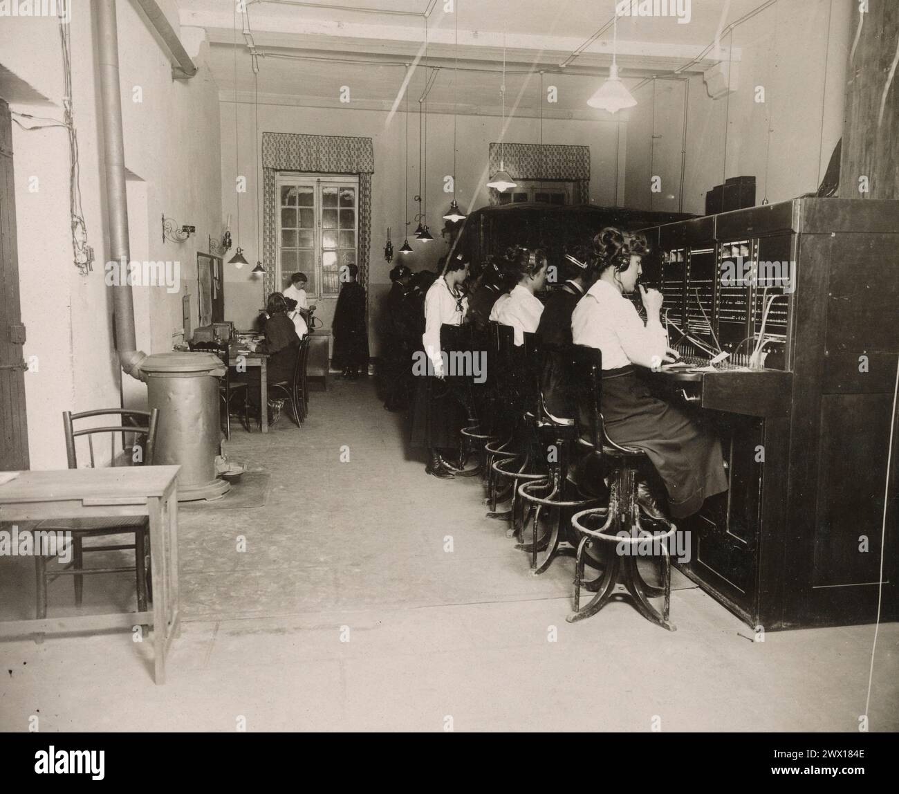Telephone operators working a switchboard during World War I; Tours ...
