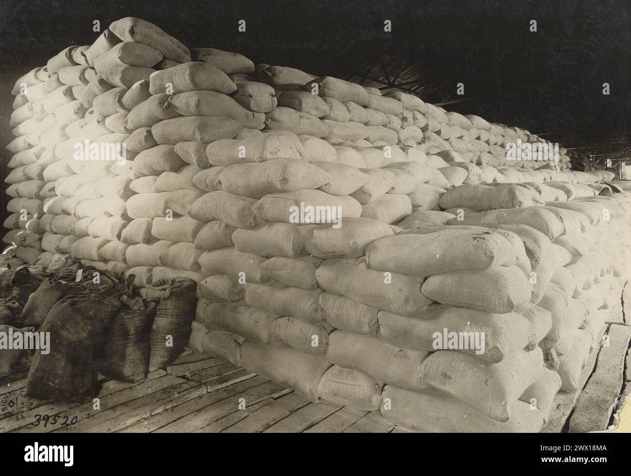 World War I photos: large bags of flour stored in a warehouse in ...
