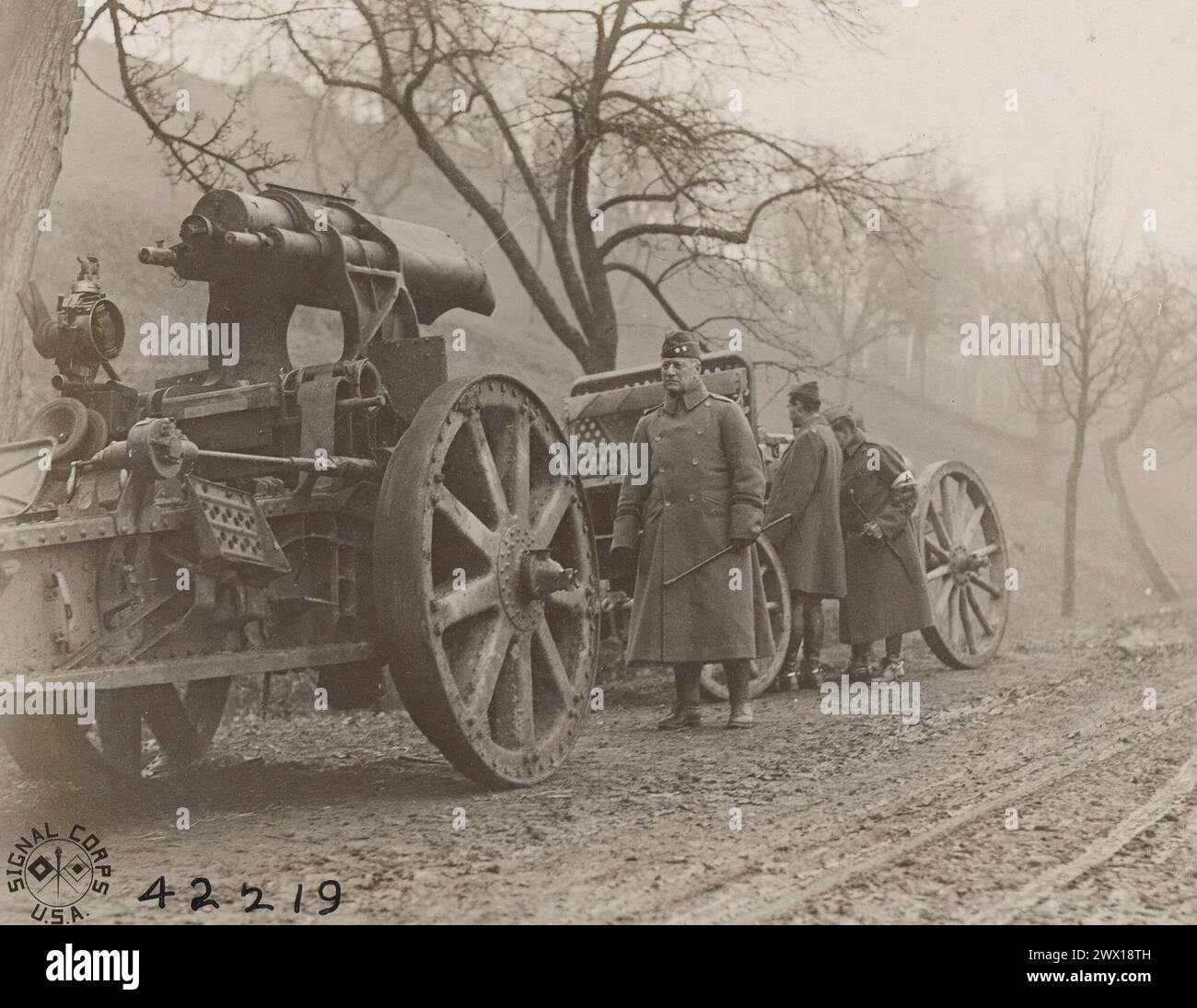 General Charles H. Muir, 4th Army Corps, examining a name plate on a ...