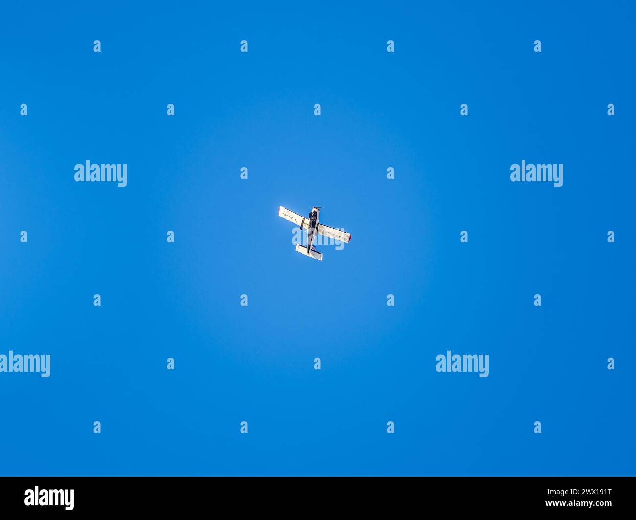 Small ultralight airplane with overhead wing and single propeller ...