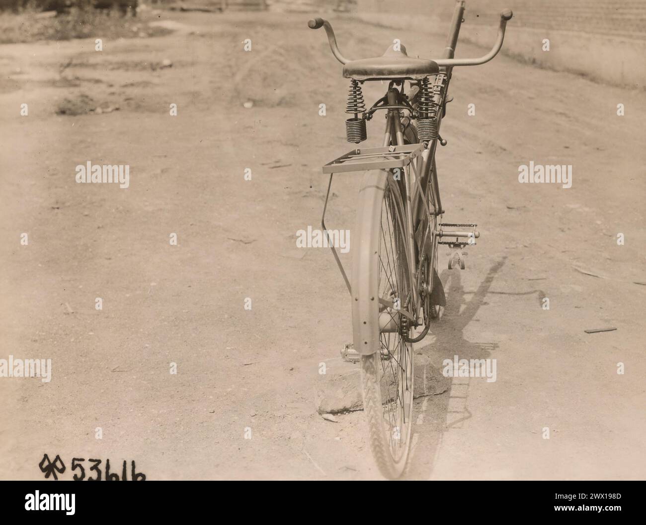 MILITARY BICYCE WITH RIFLE. Rear view of bicycle with rifle ca. May ...