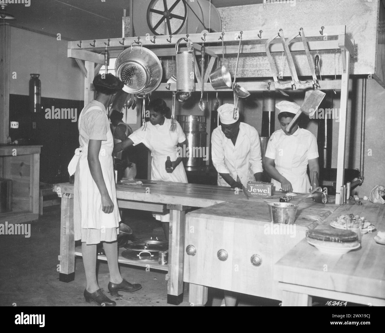 Original Caption: WAAC cooks prepare dinner for the first time in new ...