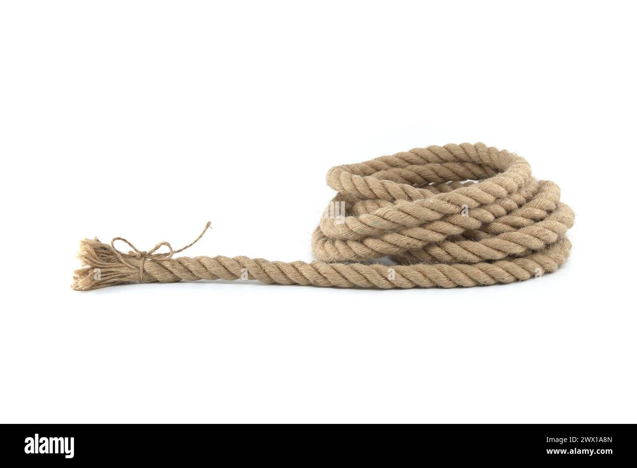 Hemp or jute rope looped and entwined into a circular shape with one ...